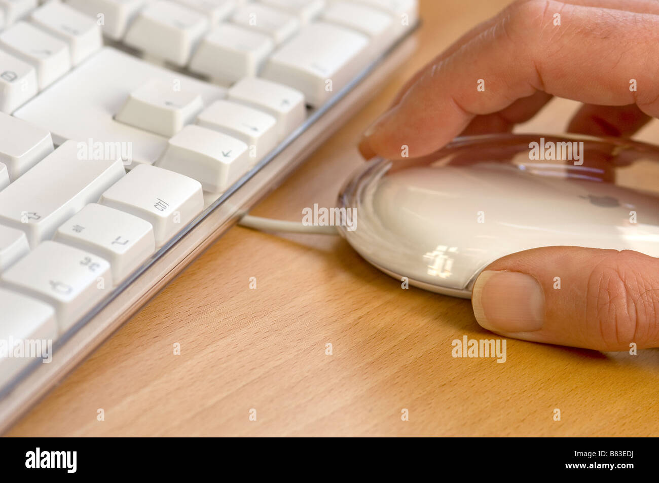 Man using mouse and computer keyboard close up Stock Photo - Alamy
