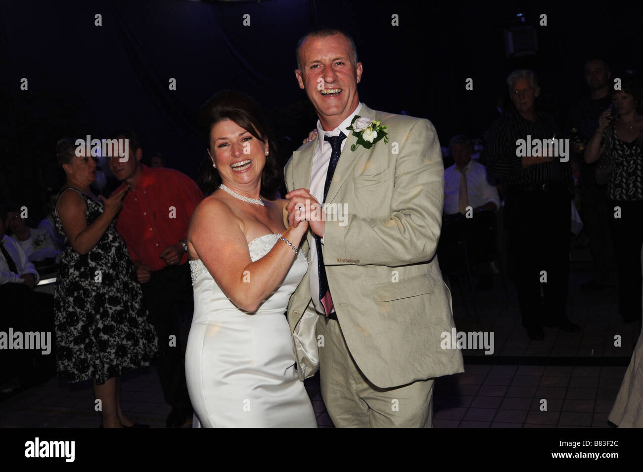 A Newly wed couple dance at their reception party, West Yorkshire Model ...