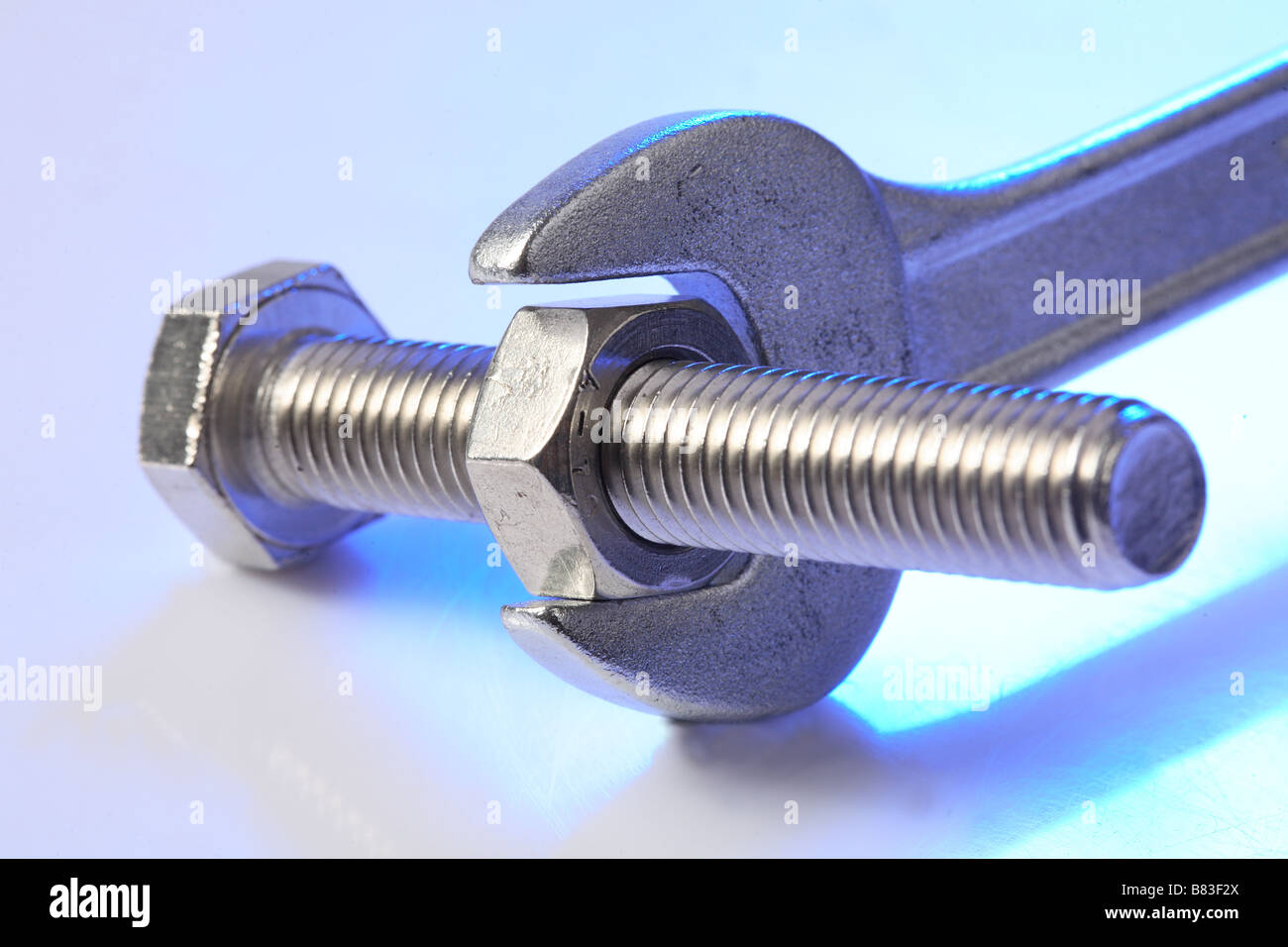 Close-up of spanner, nut and screw Stock Photo - Alamy