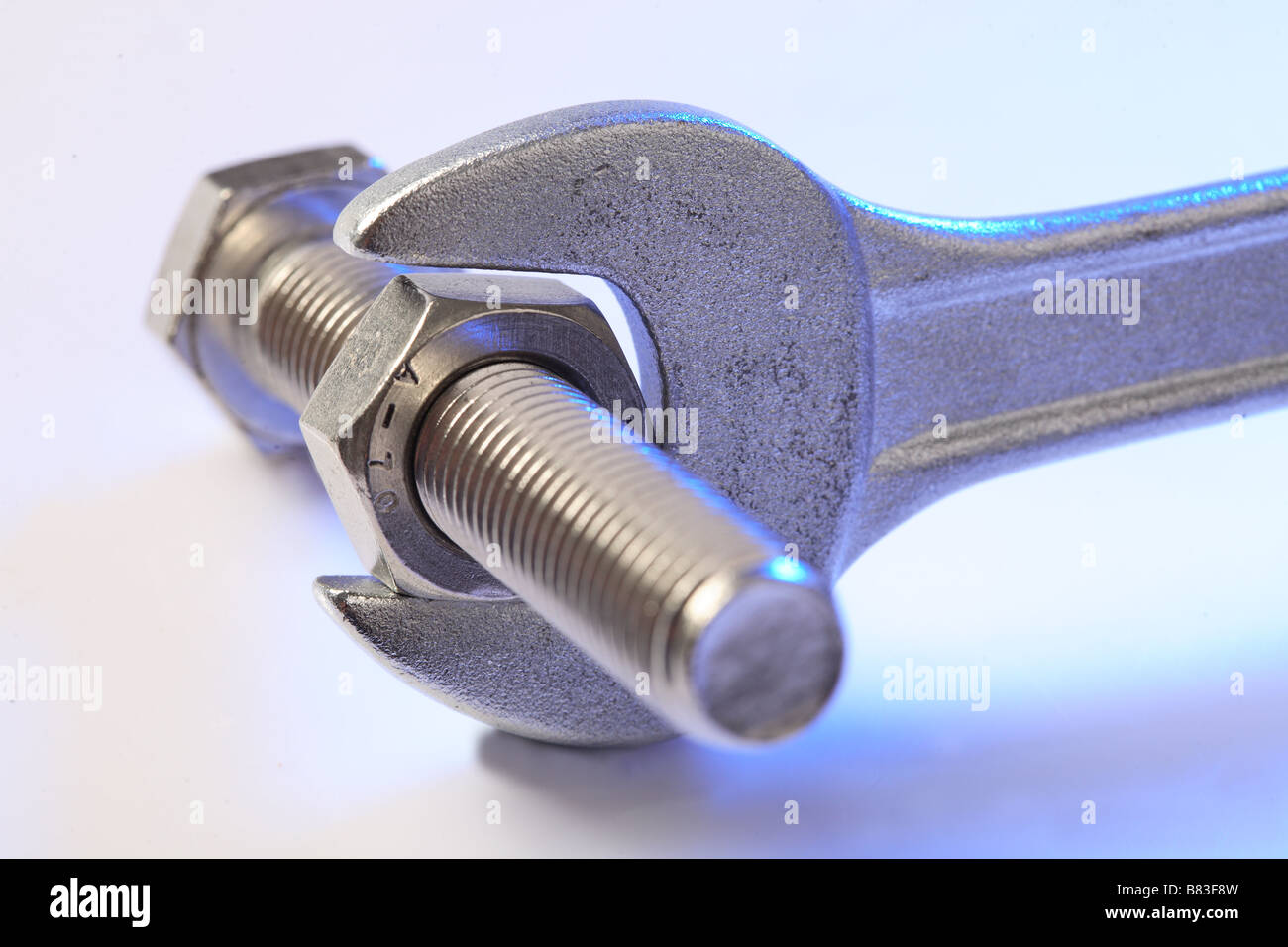 Close-up of spanner, nut and screw Stock Photo - Alamy