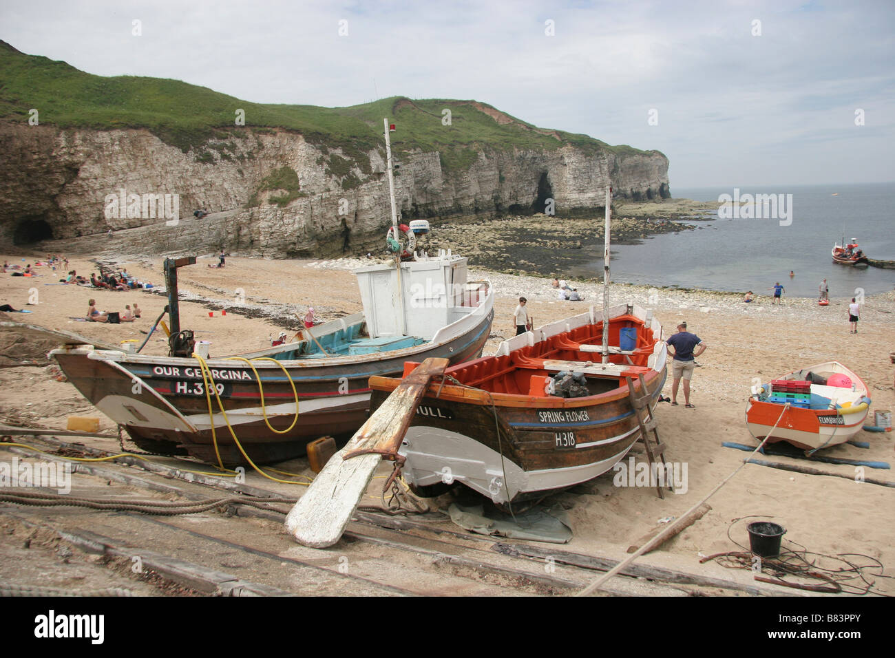 Fishing Boats Beached Stock Photo - Alamy