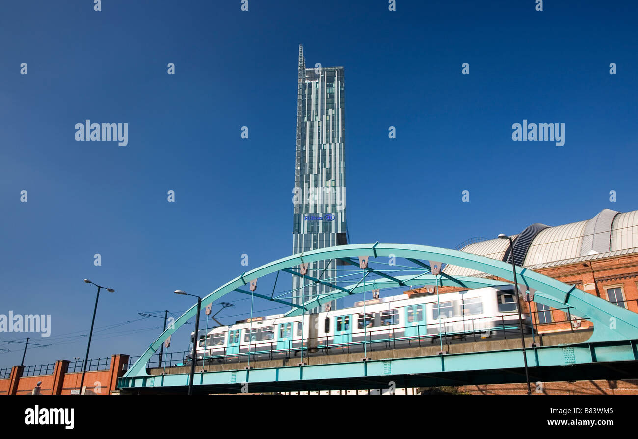 Beetham Tower and tram crossing bridge Manchester England UK Stock ...