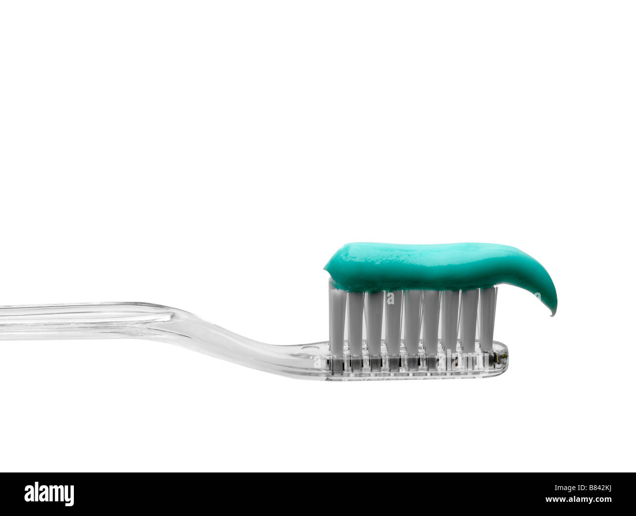 Close up of a toothbrush with paste over white hygiene and medicine ...