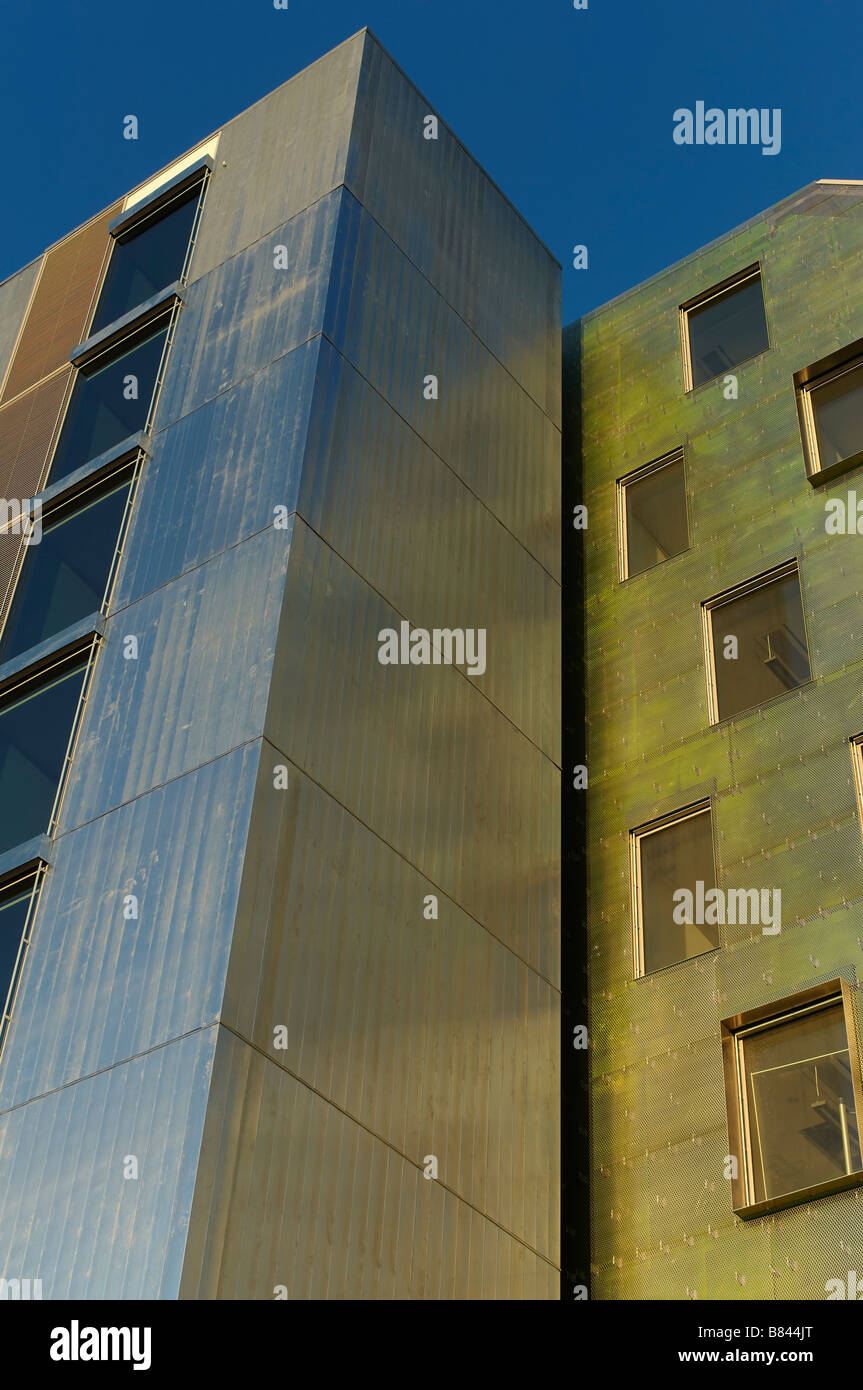 City building wall glow in morning light Stock Photo - Alamy