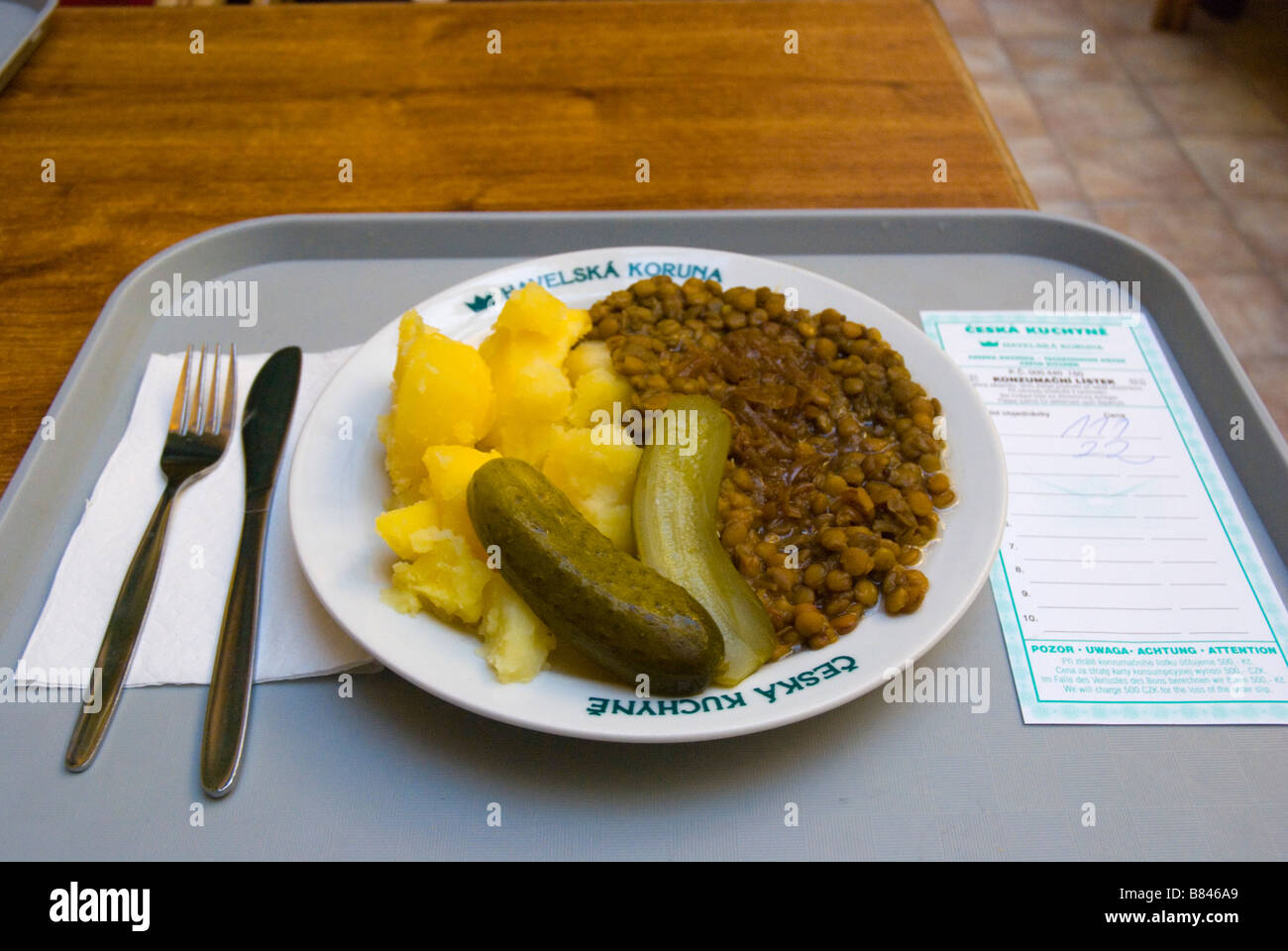 A traditional Czech meal of lentils gherkin and potatoes at a typical ...