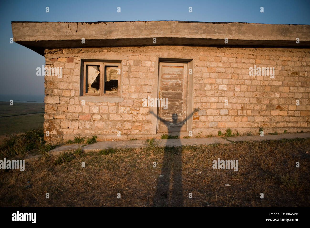 shadow playing on a poor house Stock Photo - Alamy