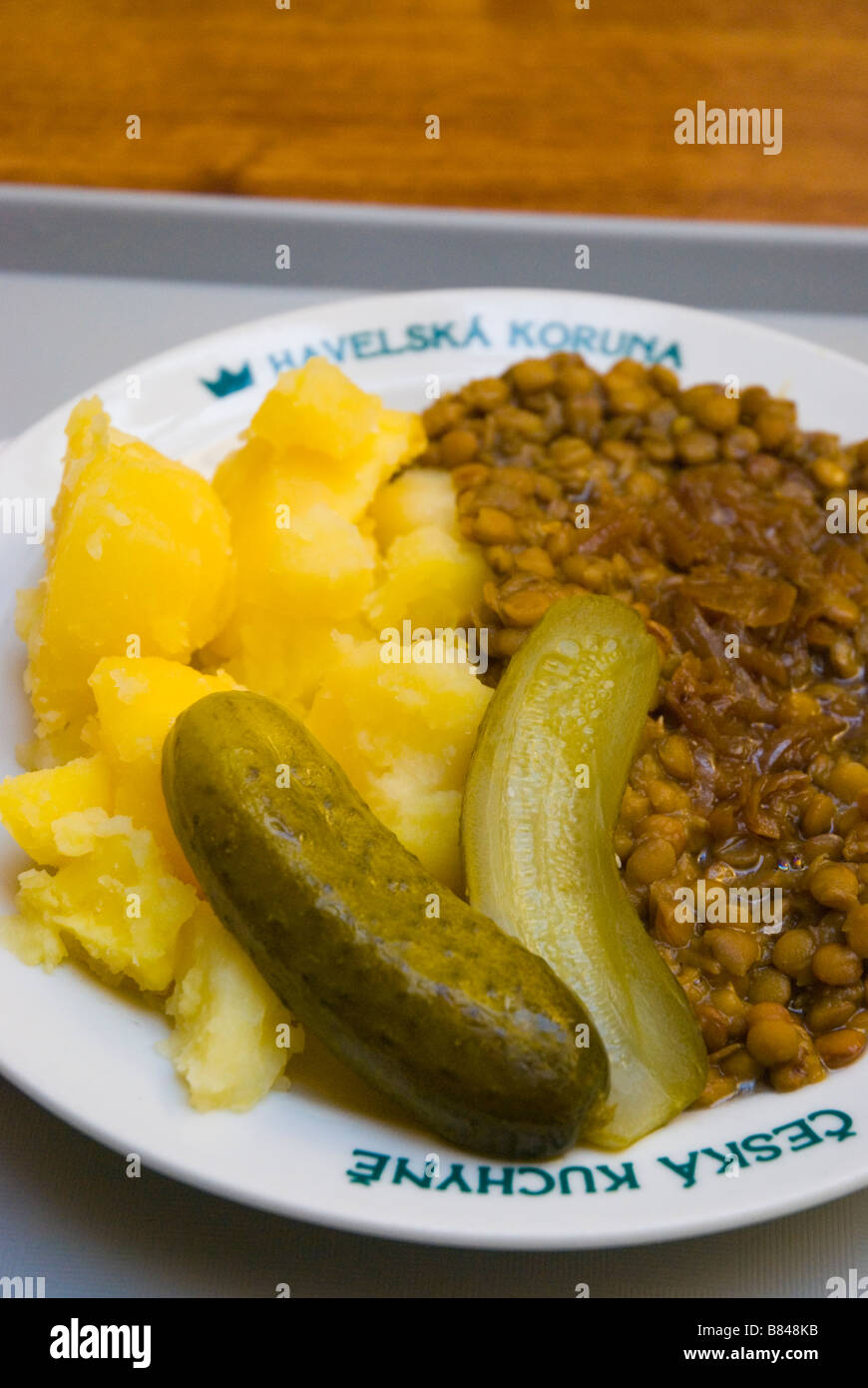 A traditional Czech meal of lentils gherkin and potatoes at a typical ...