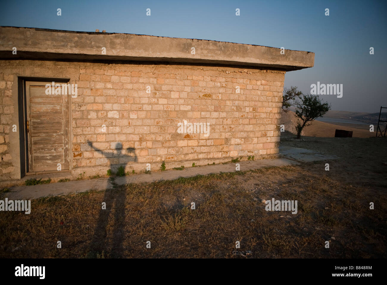 shadow playing on a poor house Stock Photo - Alamy