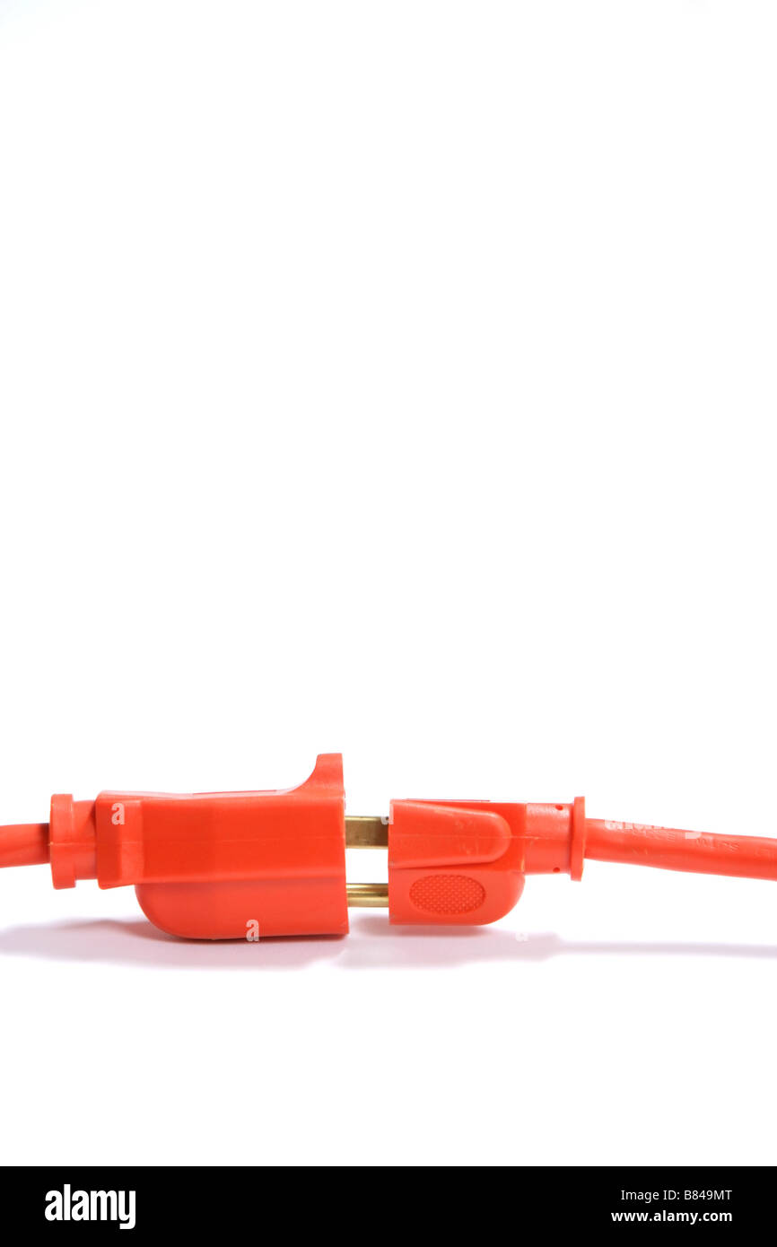 A 100 foot orange extension cord coiled up with a three way splitter ...