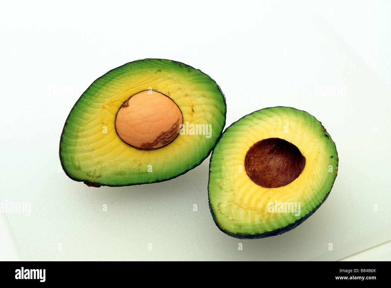 avocado cut in half still life Stock Photo - Alamy