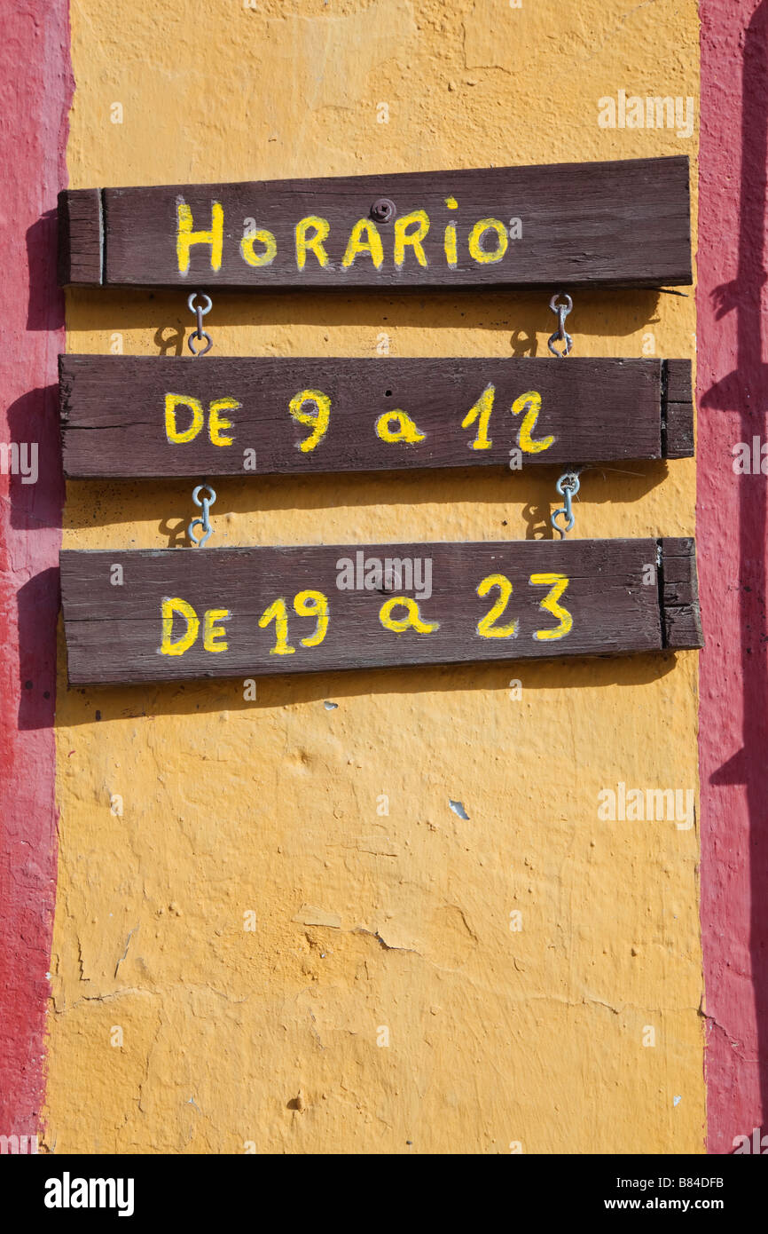 Horario or Opening Hours notice in the Spanish language outside a ...
