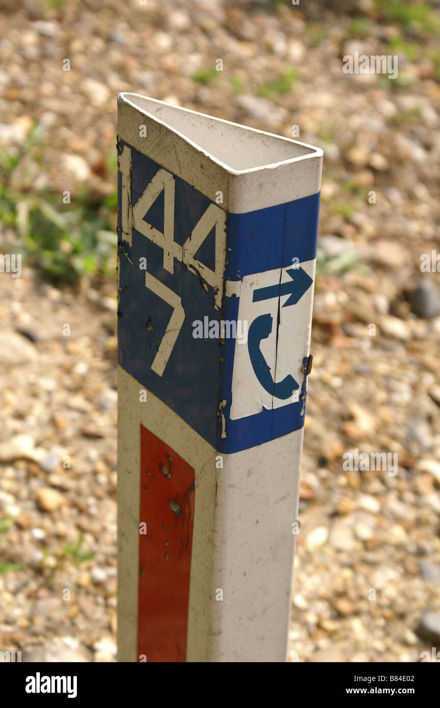 Motorway Marker Post Showing Direction To Nearest Emergency Phone Stock