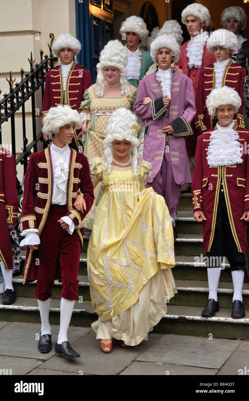 group of people in Georgian costume standing on steps outside Georgian ...
