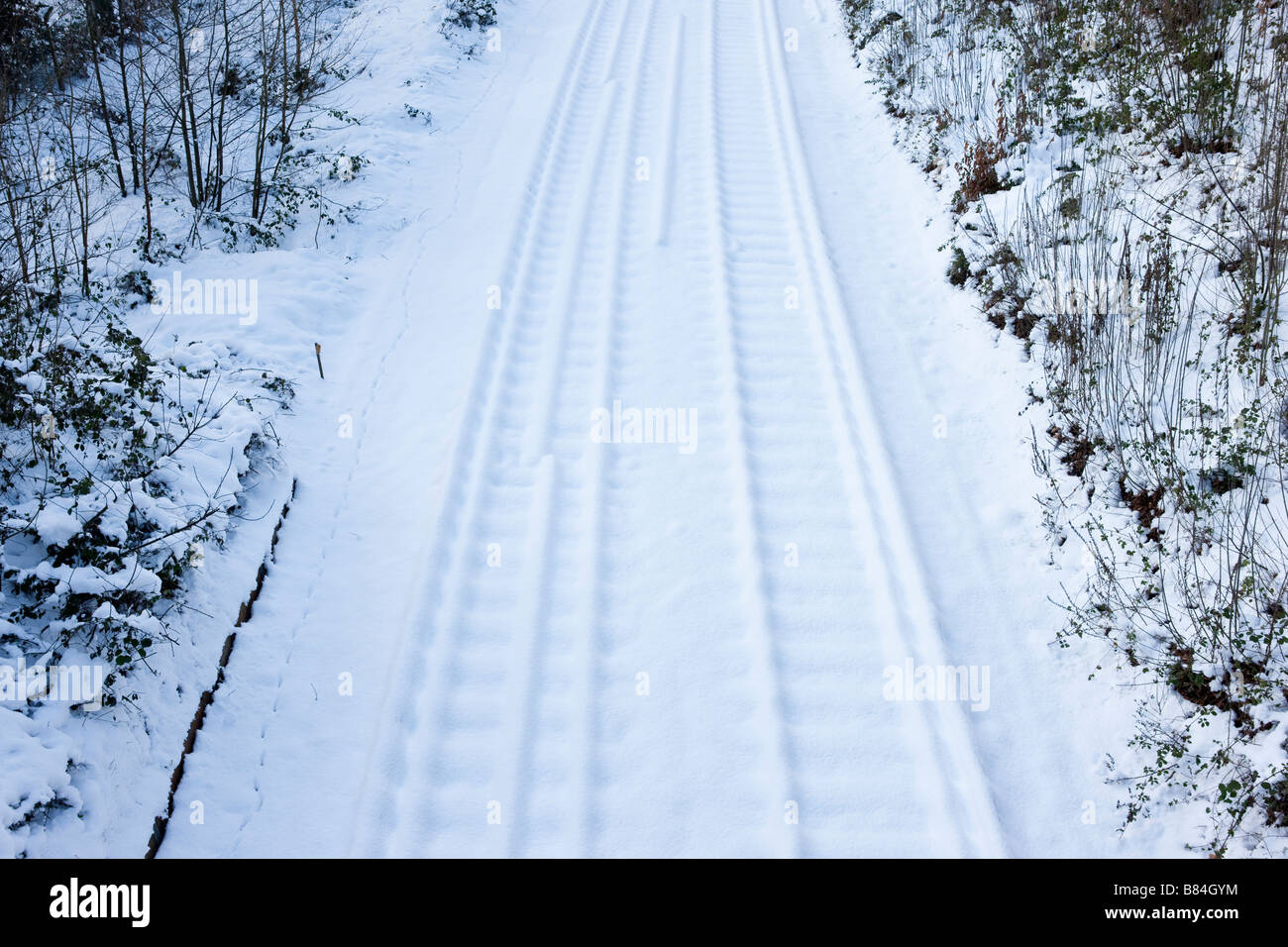 Snow covered railway tracks Stock Photo - Alamy
