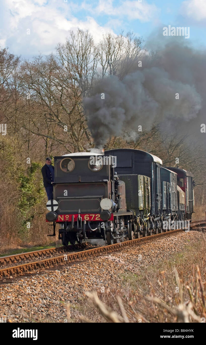 Steam tank engine pulling goods train Bluebell railway Stock Photo - Alamy