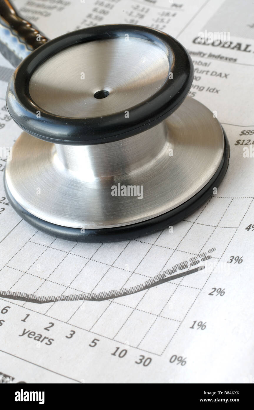 Stethoscope on newspaper financial chart Stock Photo - Alamy