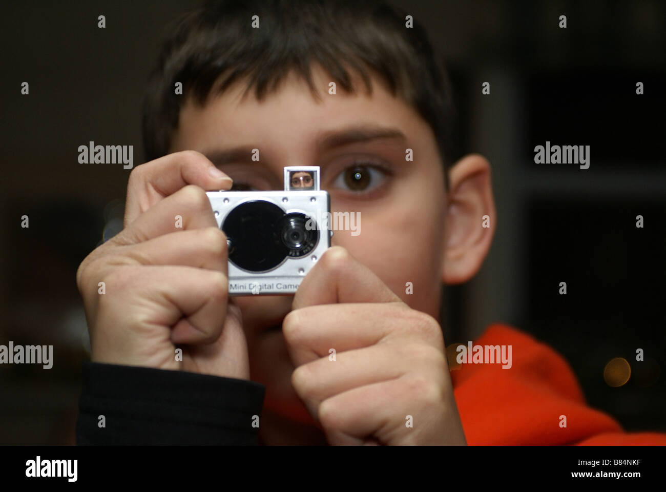 Small boy looking camera through hi-res stock photography and images ...