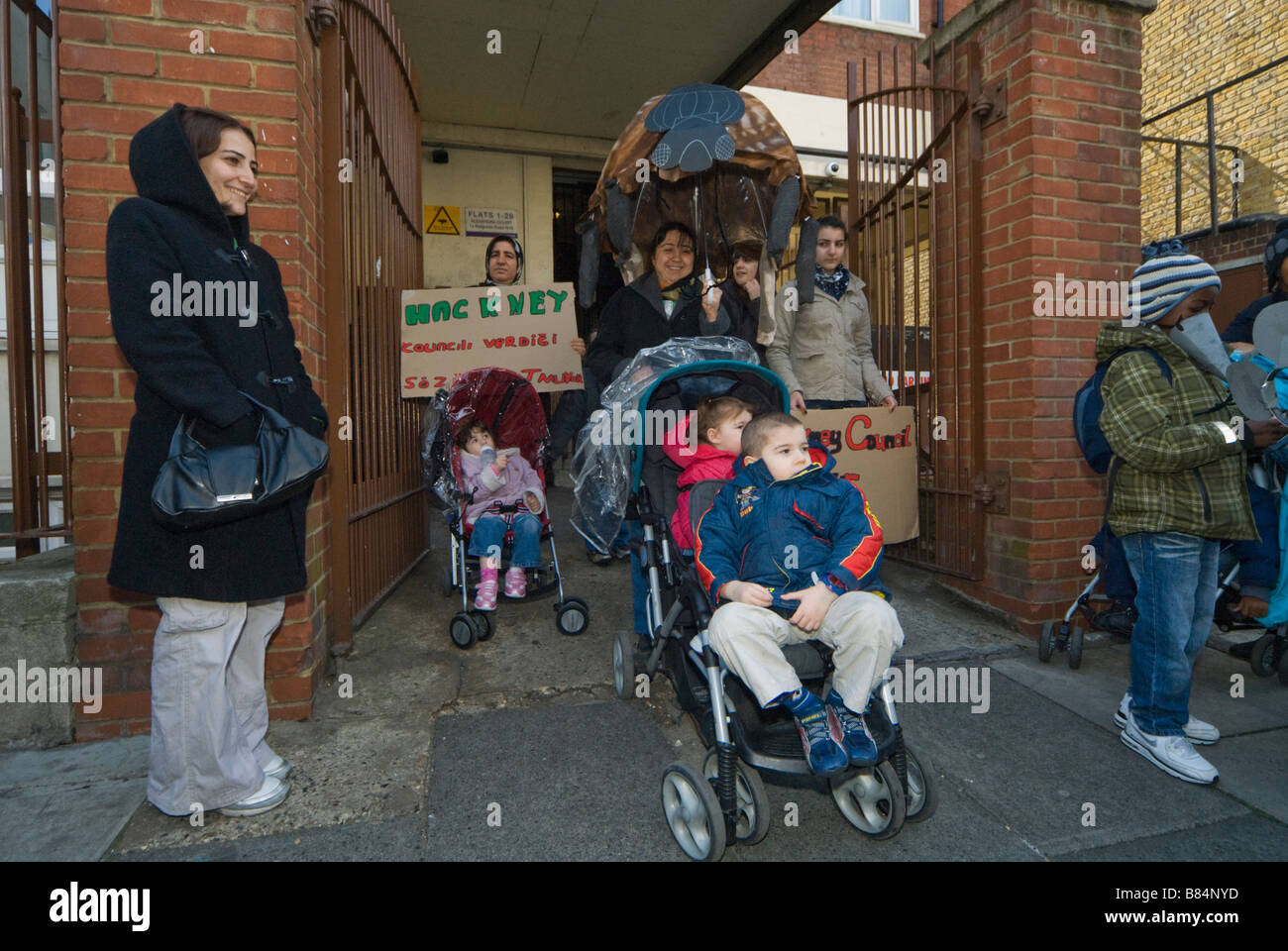 Residents of temporary hostel in Hackney protest at gate about squalid ...