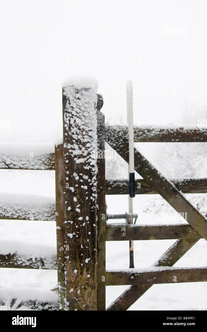 Wooden gate with snow hi-res stock photography and images - Alamy