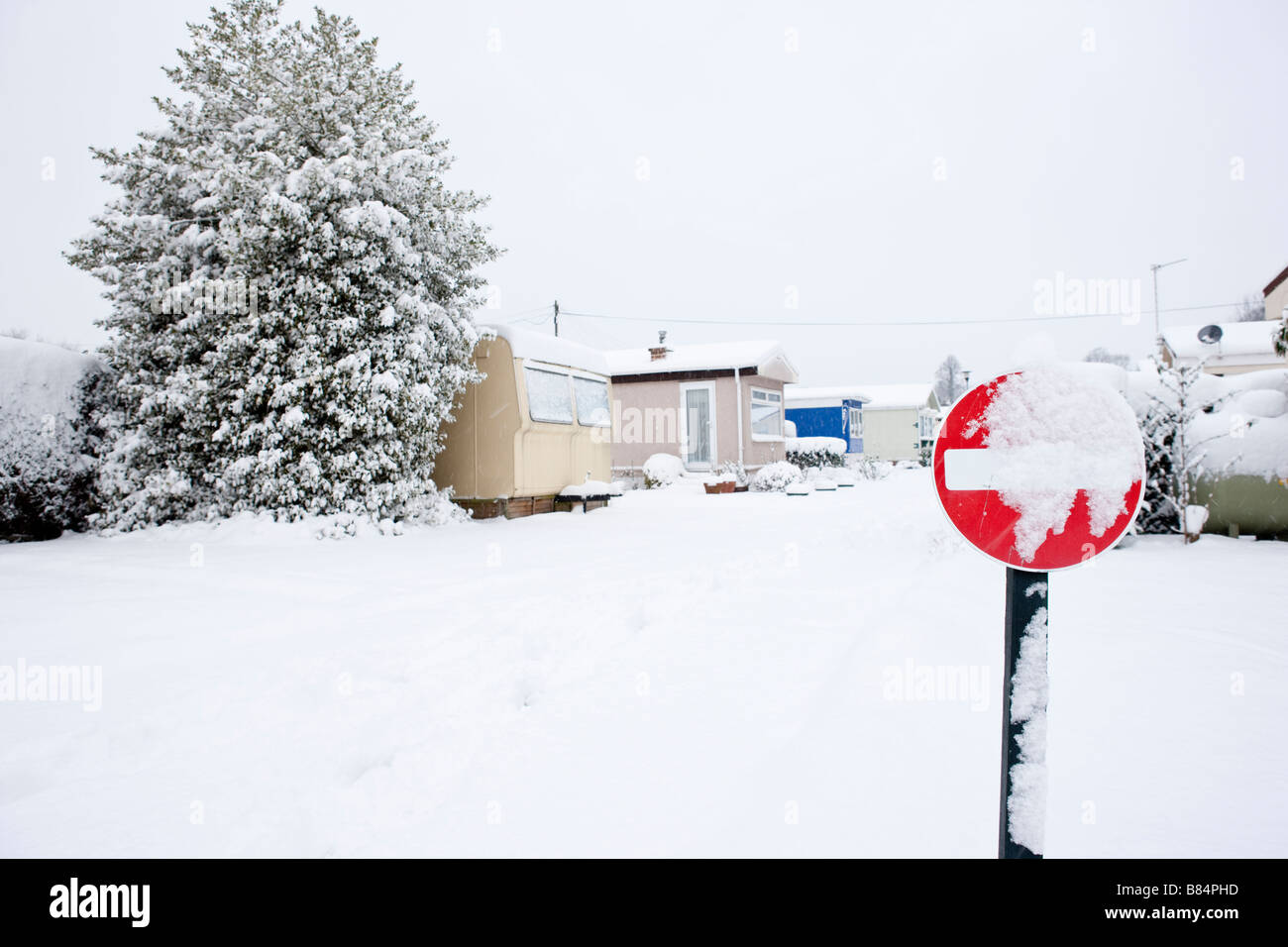A no entry sign covered in snow Stock Photo - Alamy