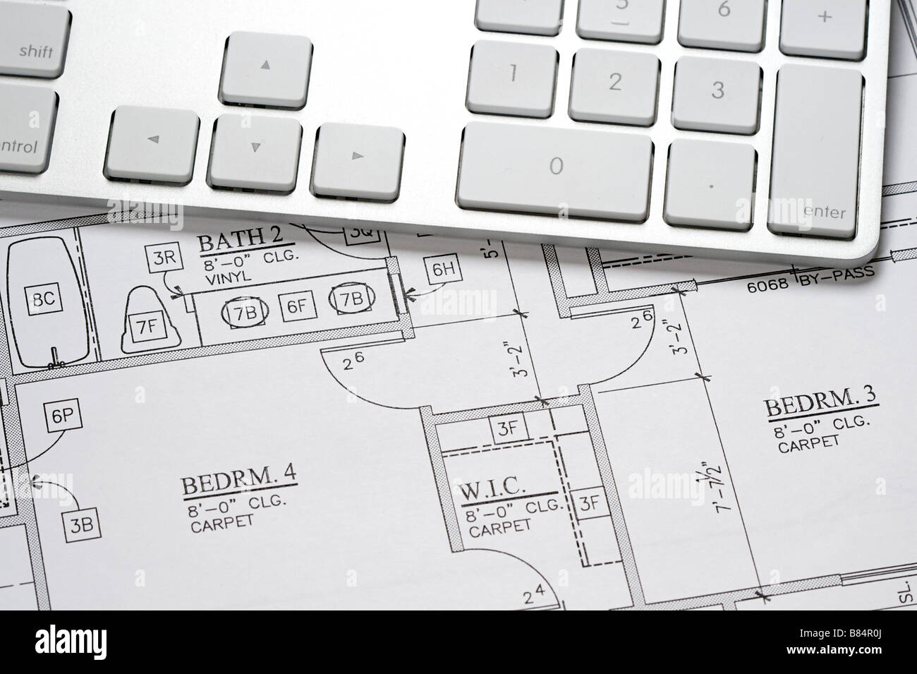 Modern arcbhitect s offic with blueprint and computer keyboard Stock ...