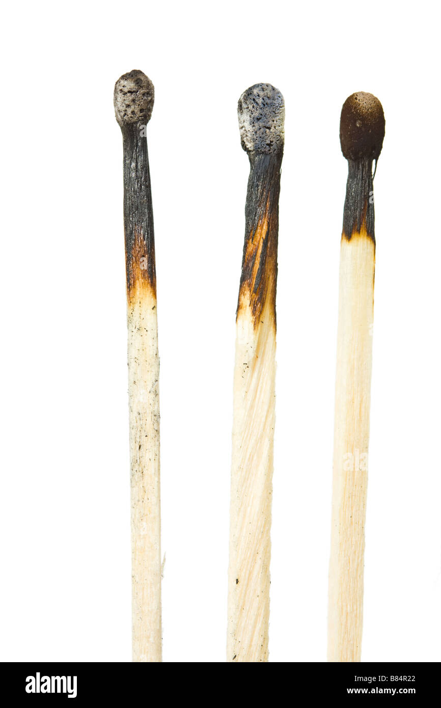 three burned matches isolated on white background Stock Photo - Alamy