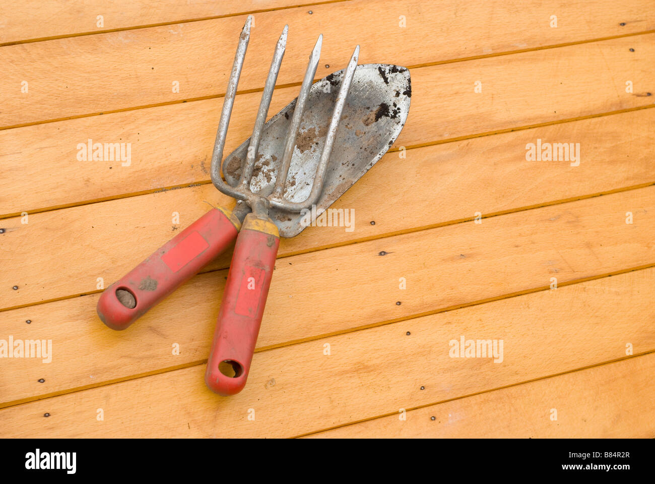 Red handled garden tools Stock Photo - Alamy