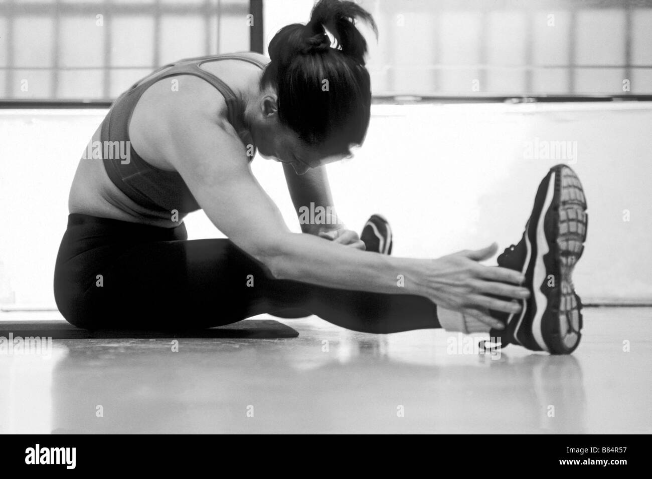 Women stretching during exercise session Stock Photo - Alamy