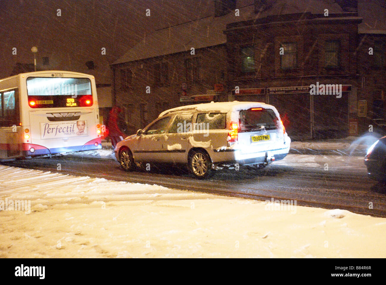 Traffic in a snow storm Stock Photo - Alamy