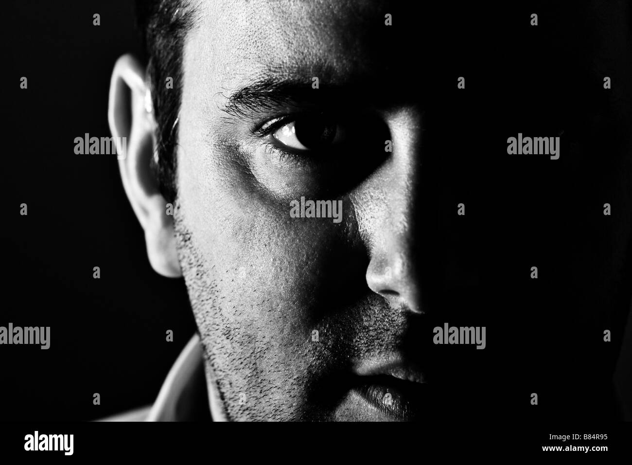Low Key Shot of a Handsome Deaf Male Stock Photo - Alamy