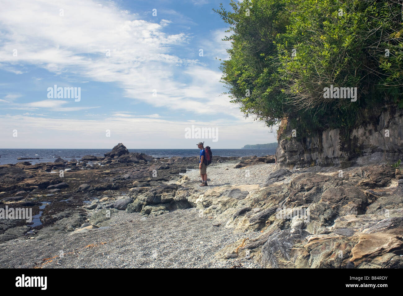 BRITISH COLUMBIA Hiker on Sombrio Beach following the Juan de Fuca ...