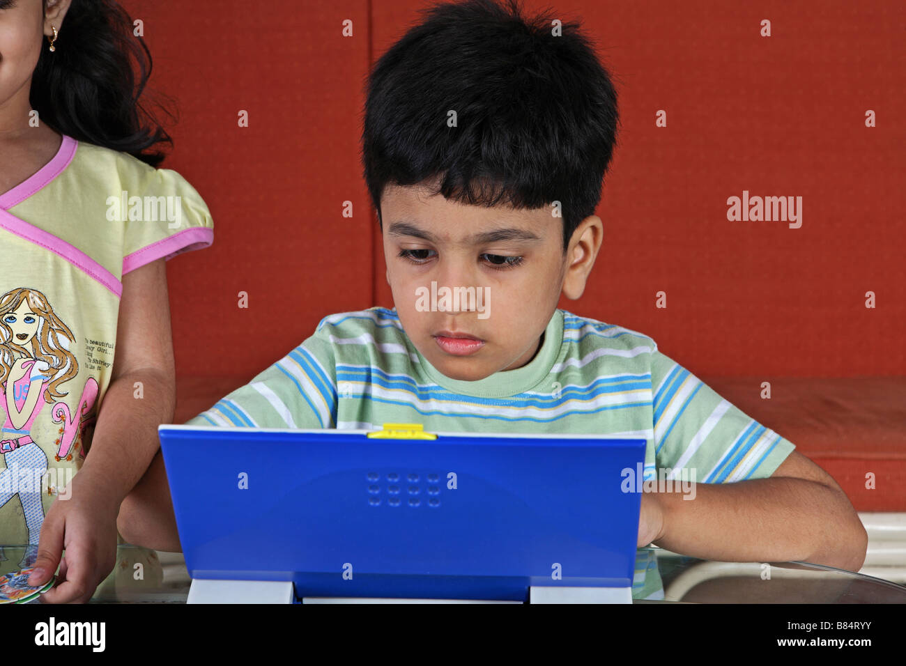 A boy playing video games Stock Photo - Alamy