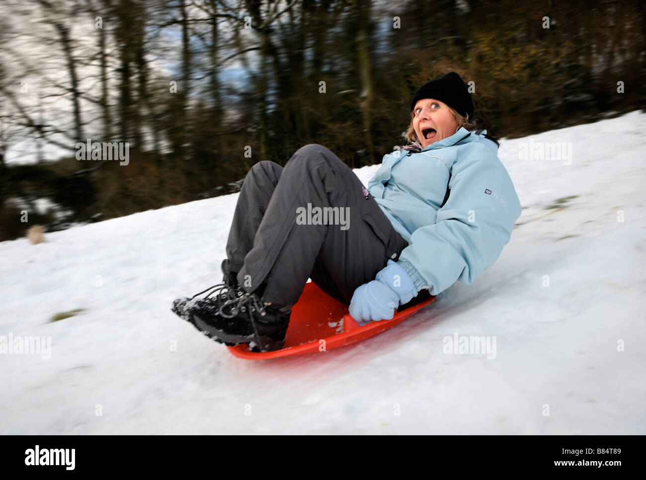 Sledging tobogganing hi-res stock photography and images - Alamy