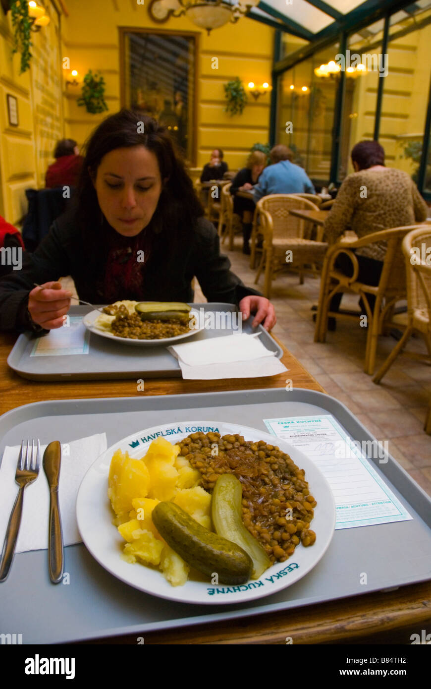 A traditional Czech meal of lentils gherkin and potatoes at a typical ...