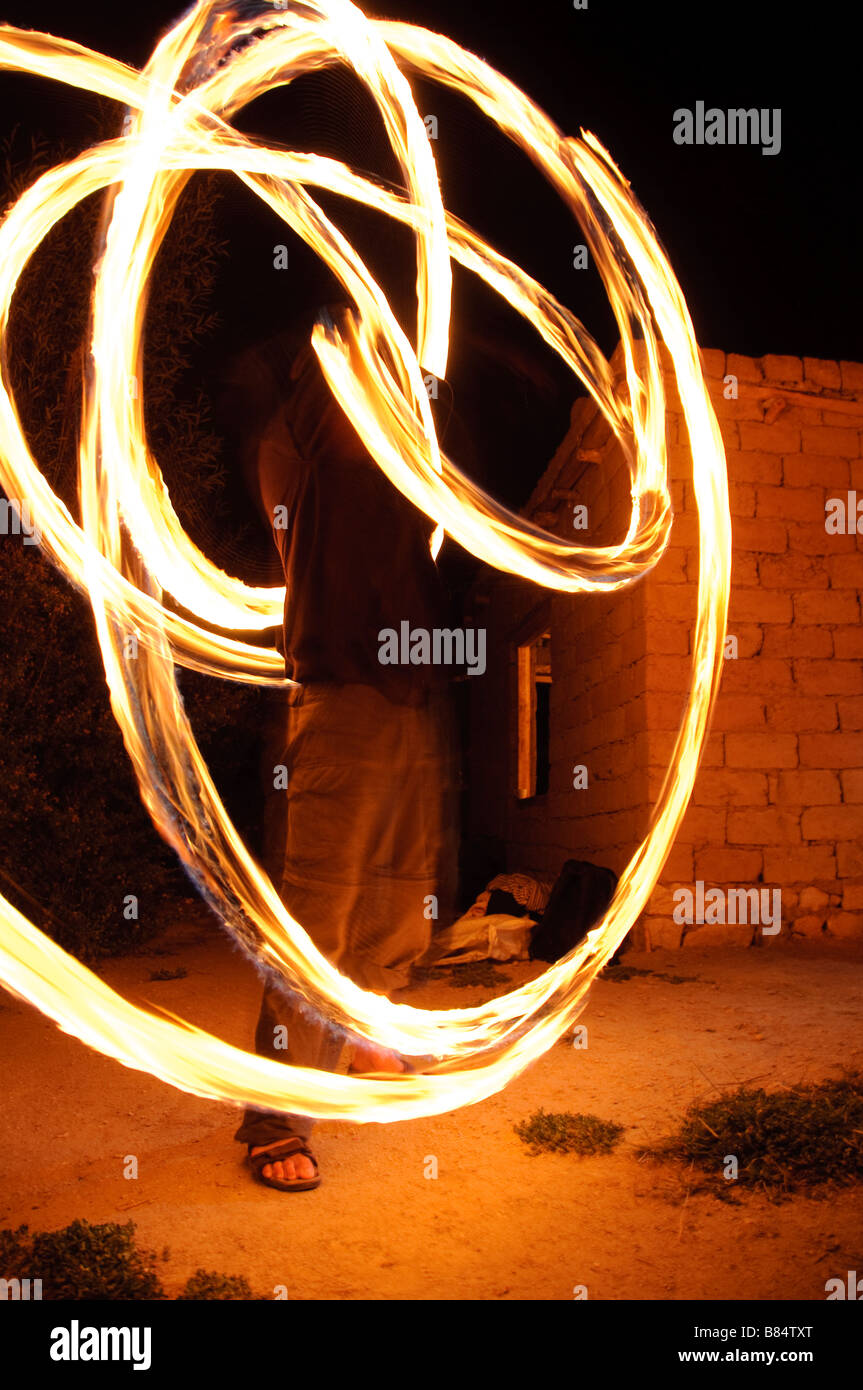 Poi spinning hi-res stock photography and images - Alamy