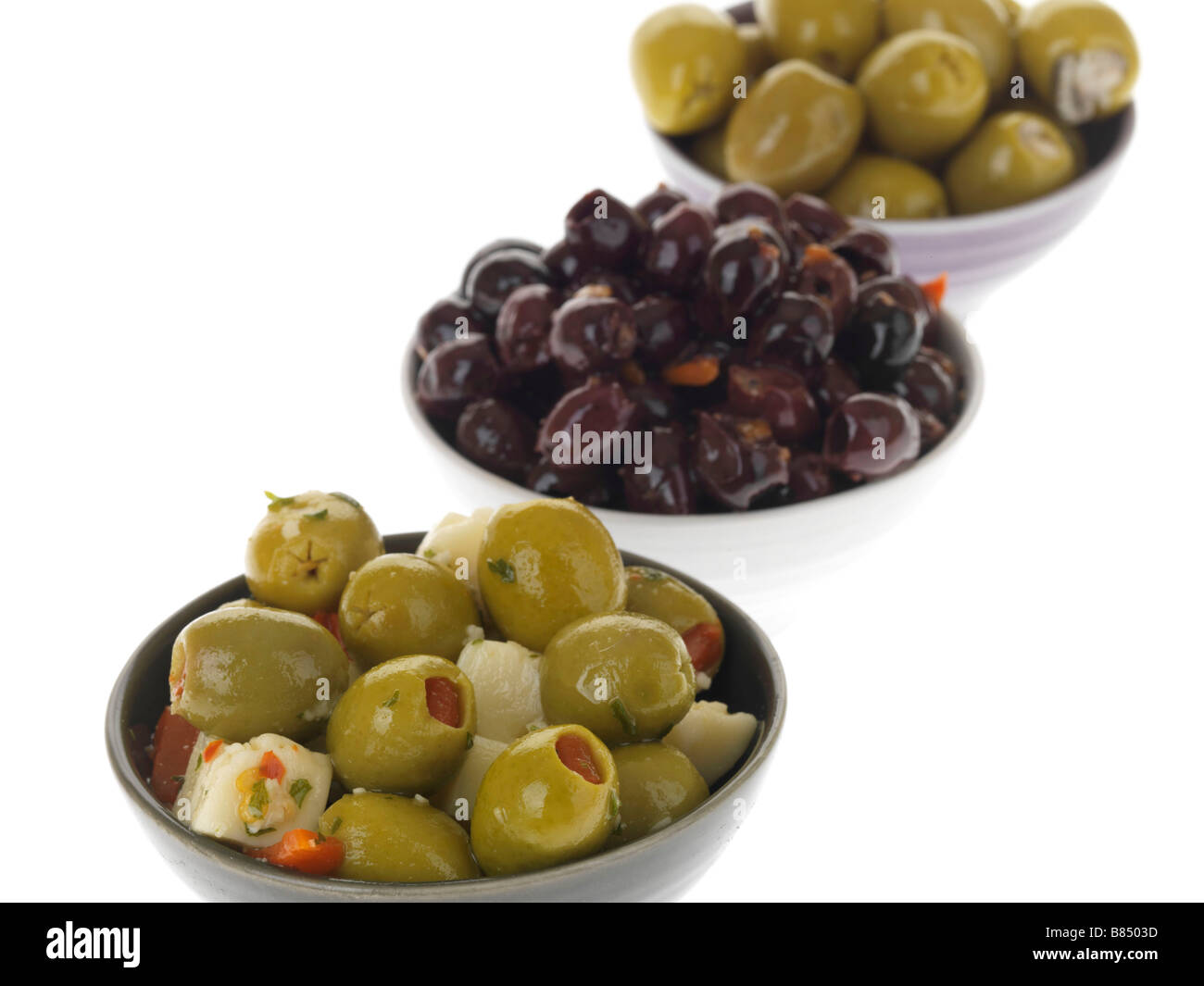 Bowls Of Mixed Green And Black Healthy Ripe Savoury Olives Isolated ...