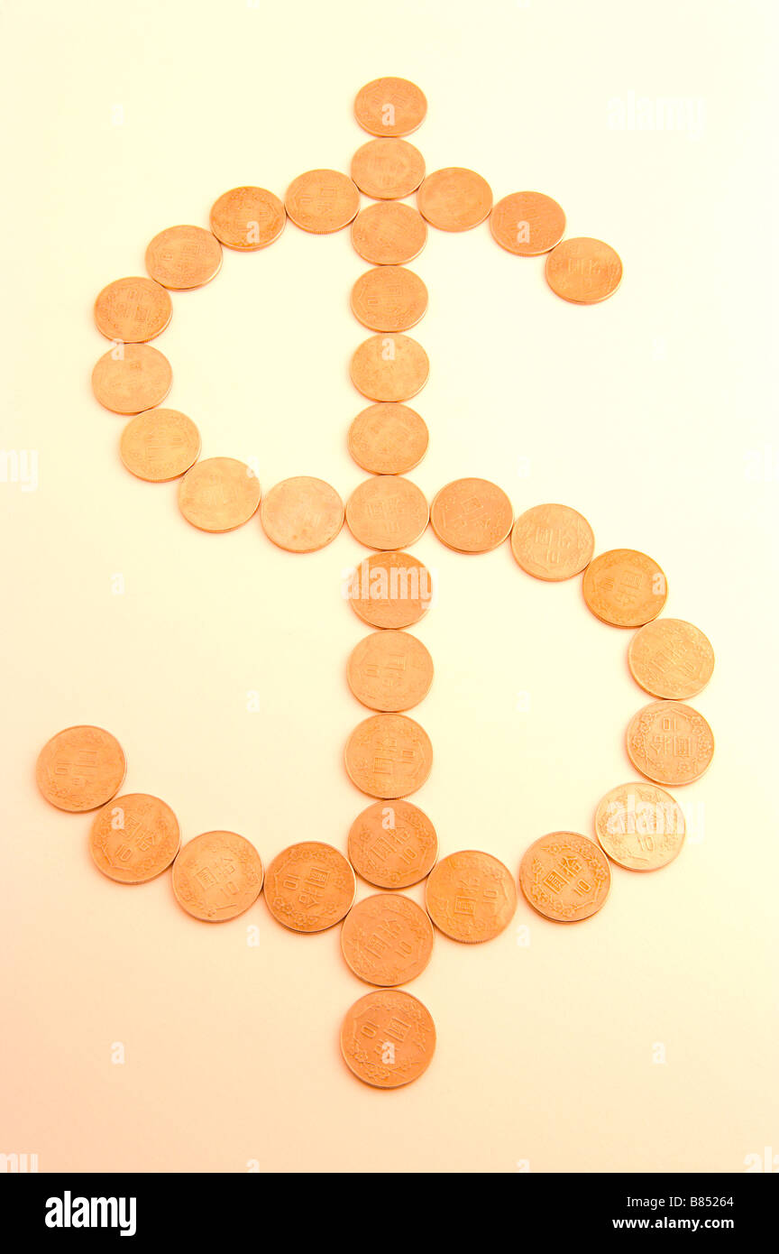 Coins arranged in a money sign Stock Photo - Alamy