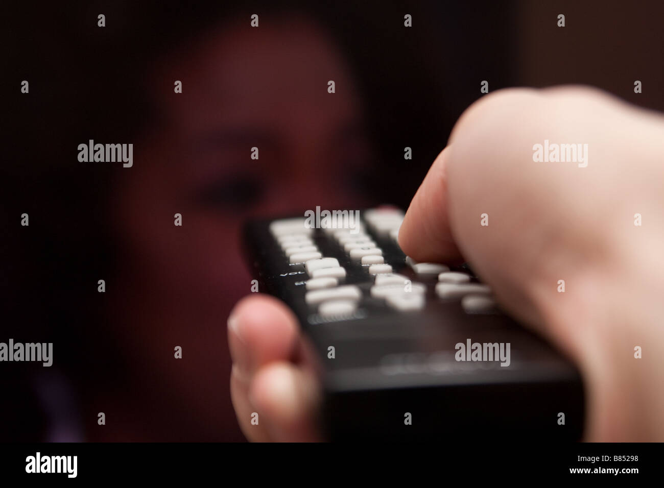 Changing channel on TV Stock Photo - Alamy