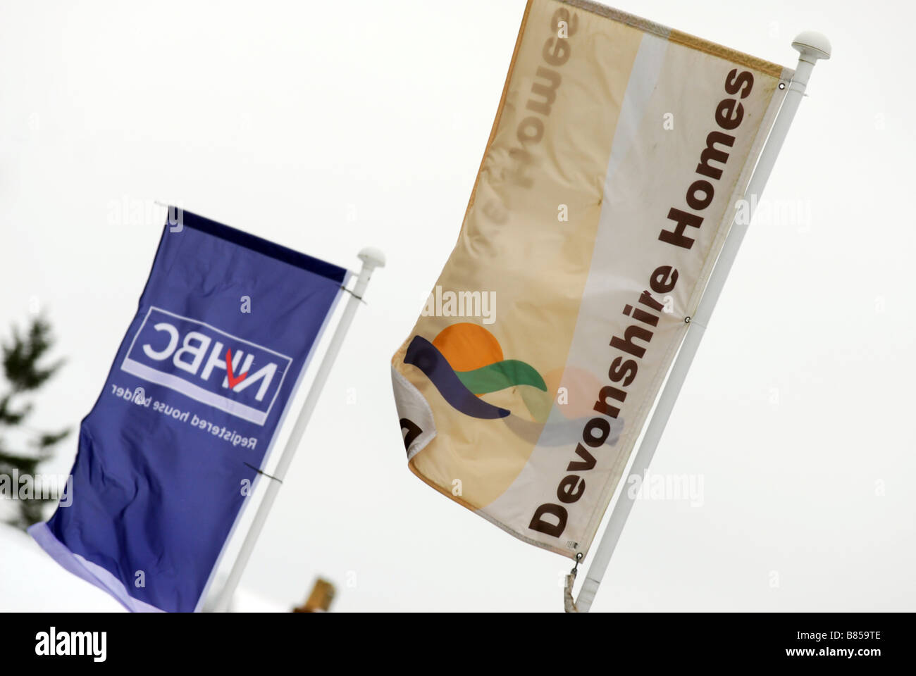 NHBC and Devonshire Homes flags on a new site in Tiverton Devon Stock ...