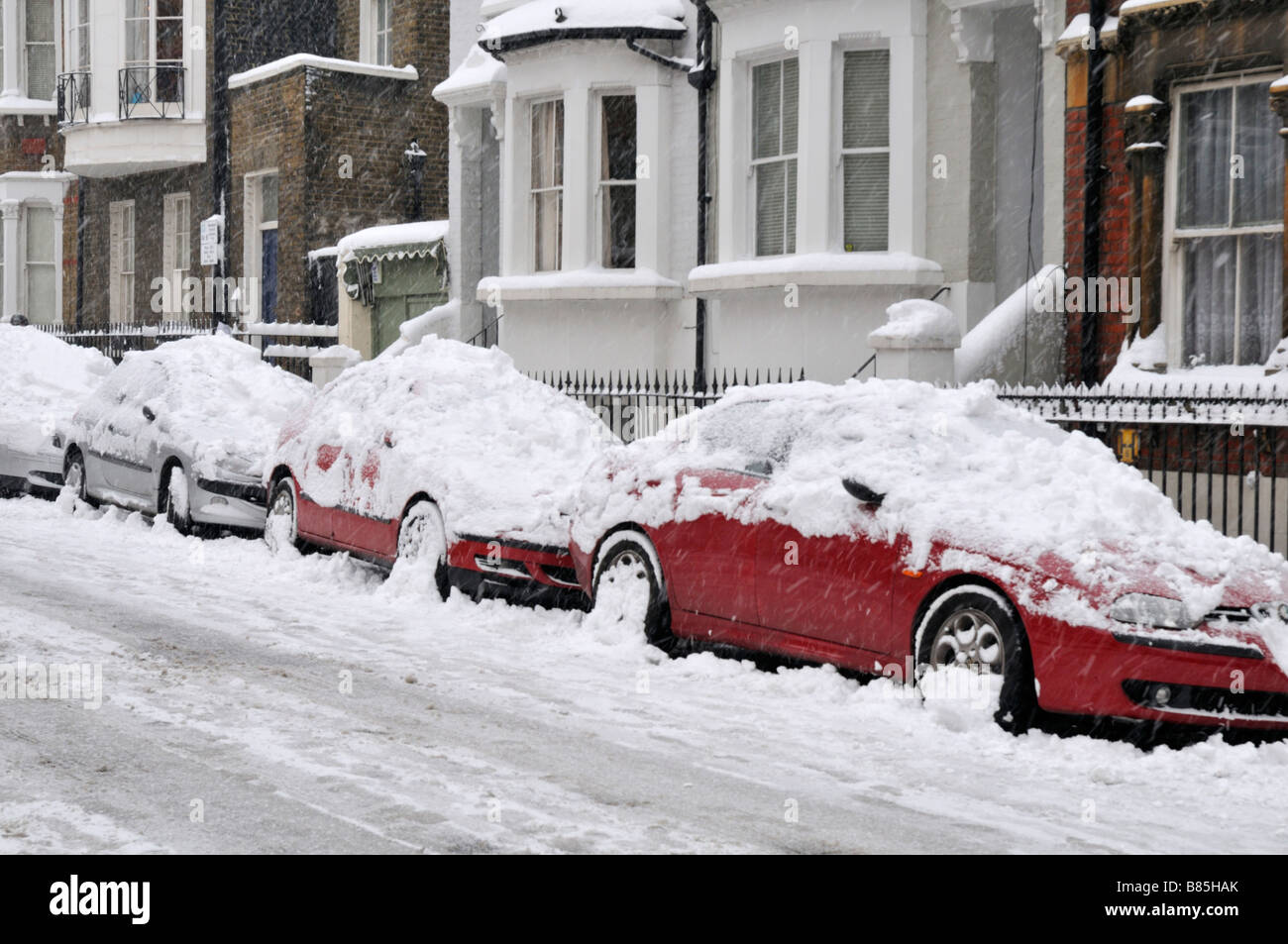 Snowy car lined street Greenwich London United Kingdom Stock Photo - Alamy