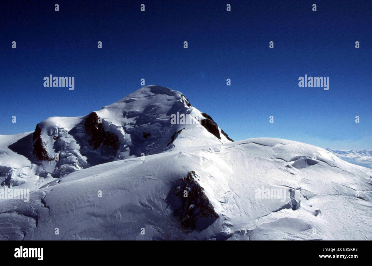 Massif du Mont Blanc. Dôme du Gouter and the summit of Mont Blanc Stock ...