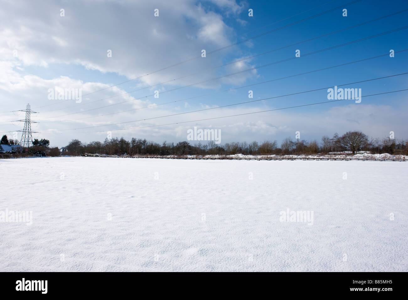 Electricity pylons covered in snow hi-res stock photography and images ...