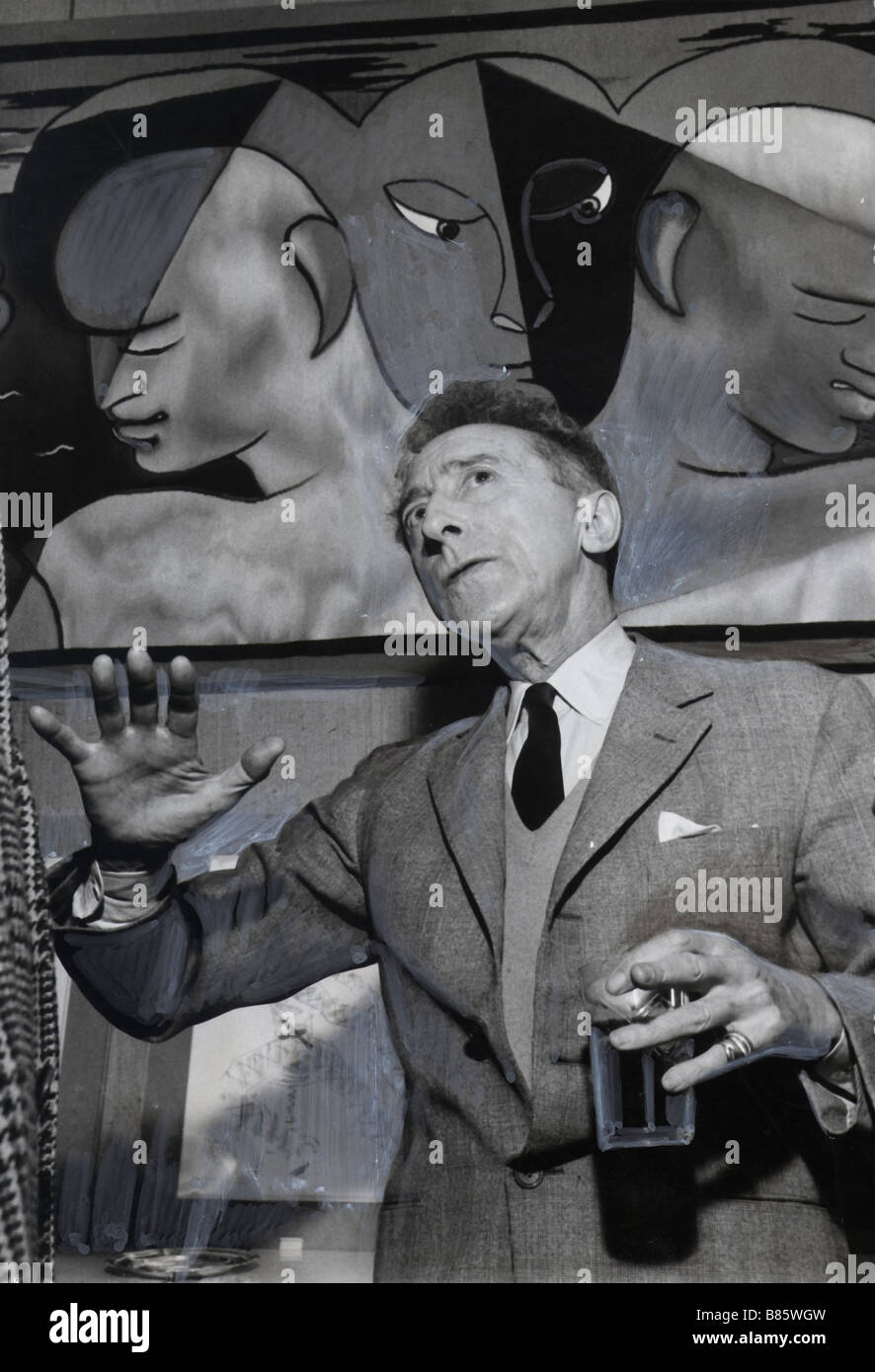 Cocteau standing by an Aubusson tapestry, made after one of his ...