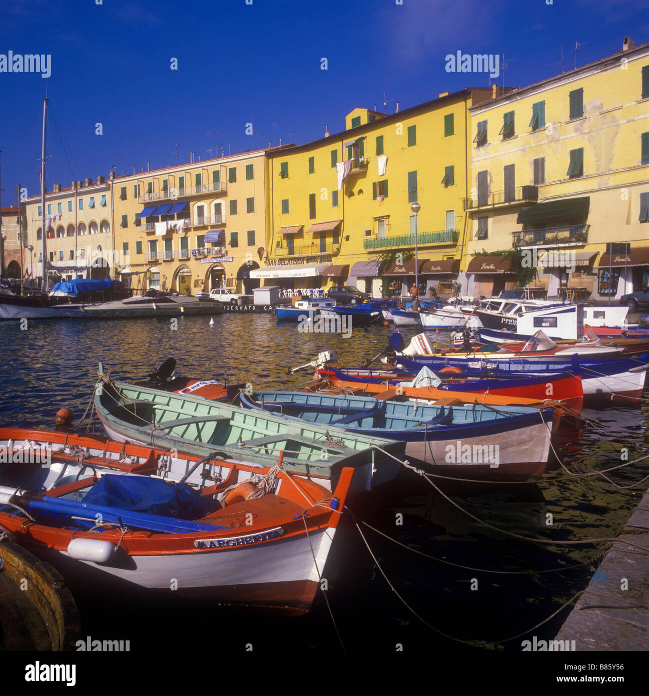 Colourful fishing boat harbour in Portoferraio, the largest city and ...