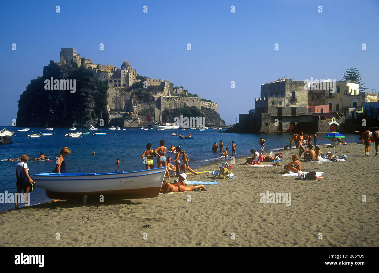 Ischia Town Beach with view showing Castello Aragonese on the island of ...