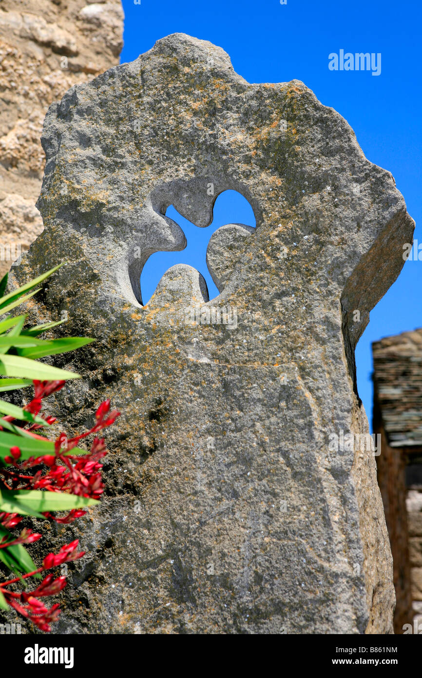 A stone carved dove, symbol of the Cathars in Minerve, southern France ...