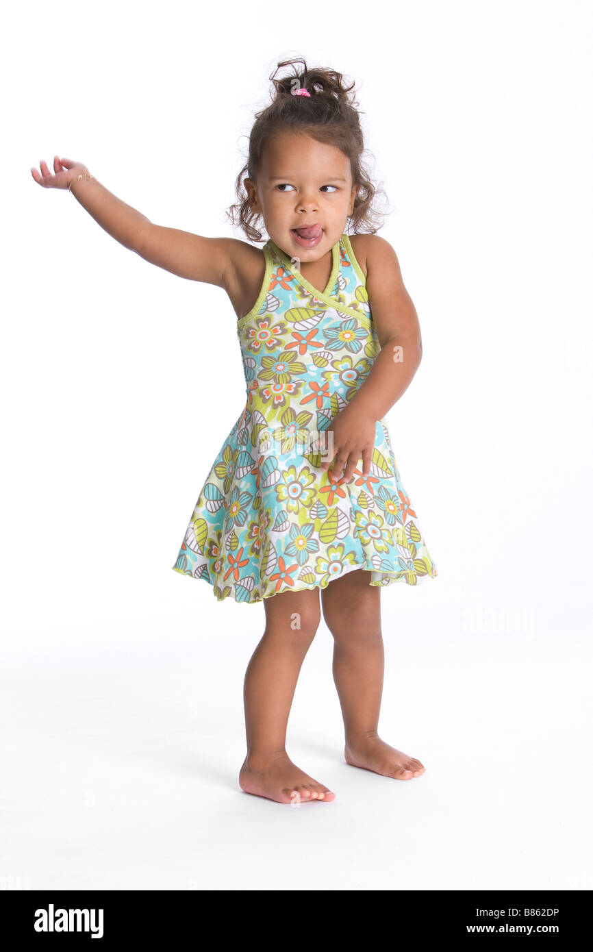 Little girl is dancing around Stock Photo - Alamy