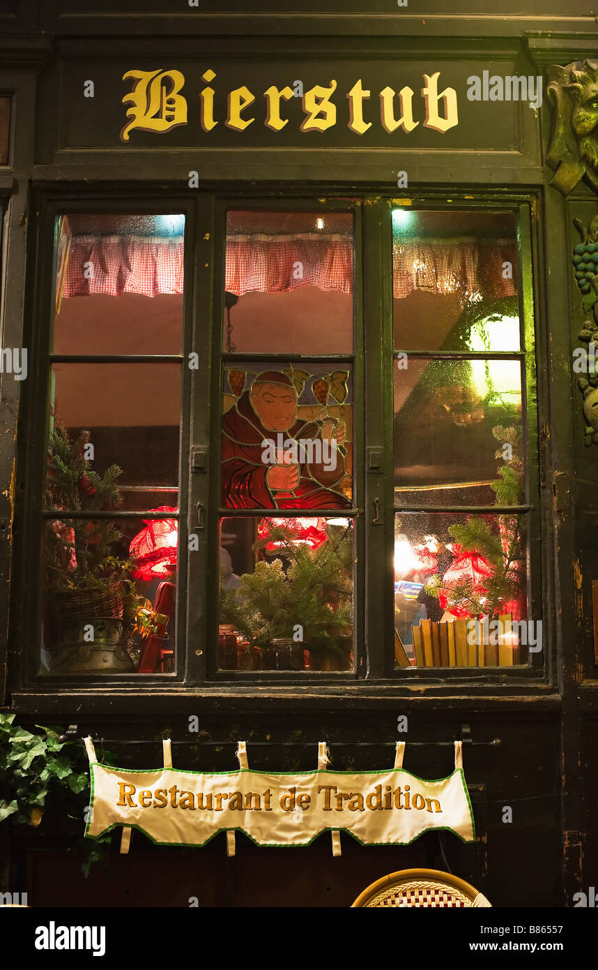 Decorated wine and beer bar window at night, Christmas time, Strasbourg ...