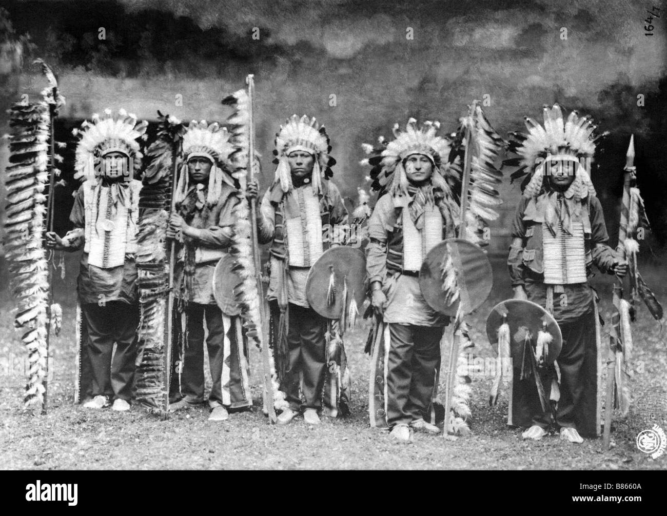 Photo card representing an Indian tribe with their weapons Stock Photo ...