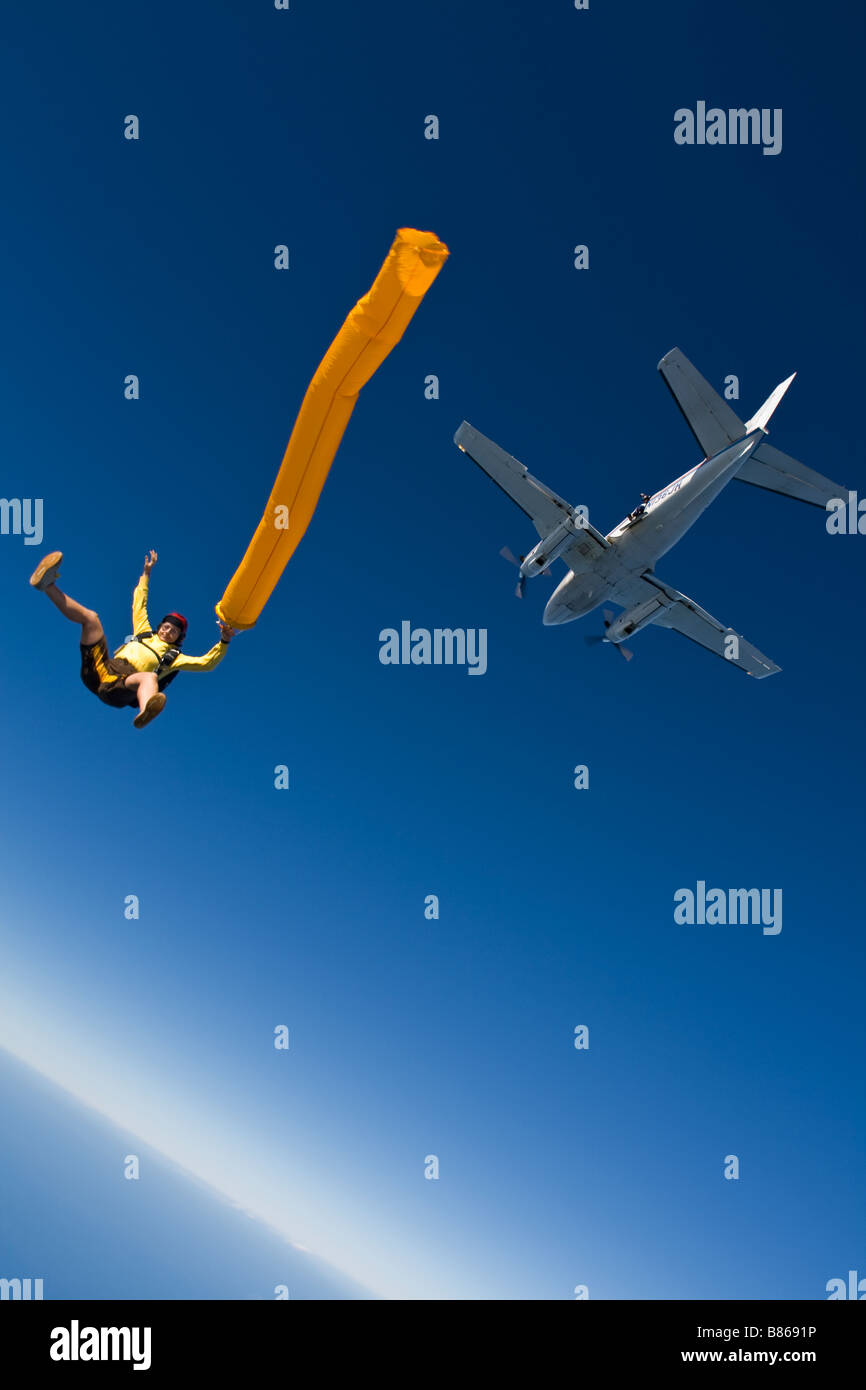 Skydive tube jumper over Oahu, Hawaii, USA. Man is flying in freefly ...